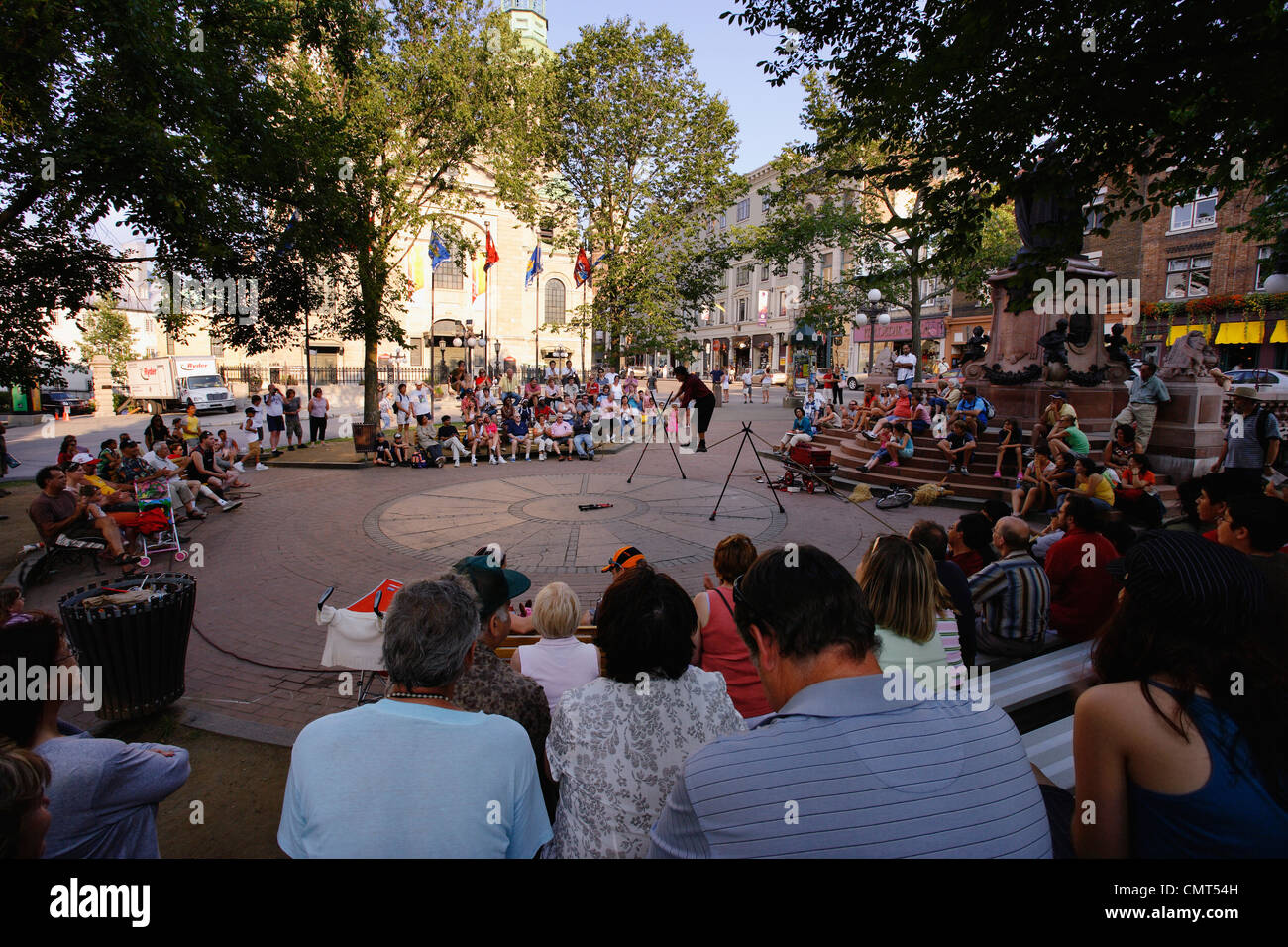 Street Performer Balancing on Rope with Crowd of Spectators, Quebec ...