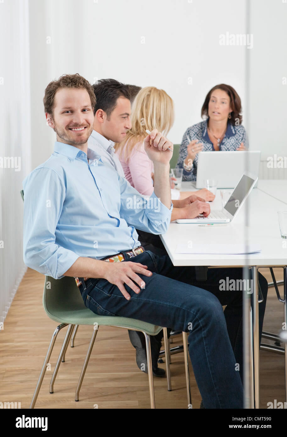 Portrait of smiling man at work Stock Photo - Alamy