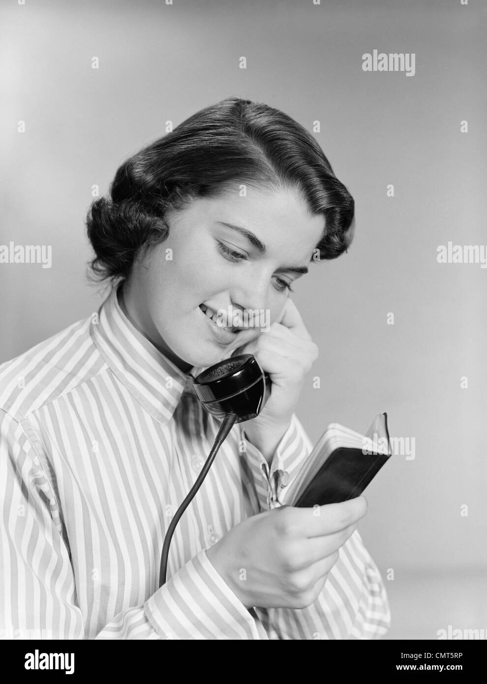 Female speaking on the phone 1950s hi-res stock photography and images ...