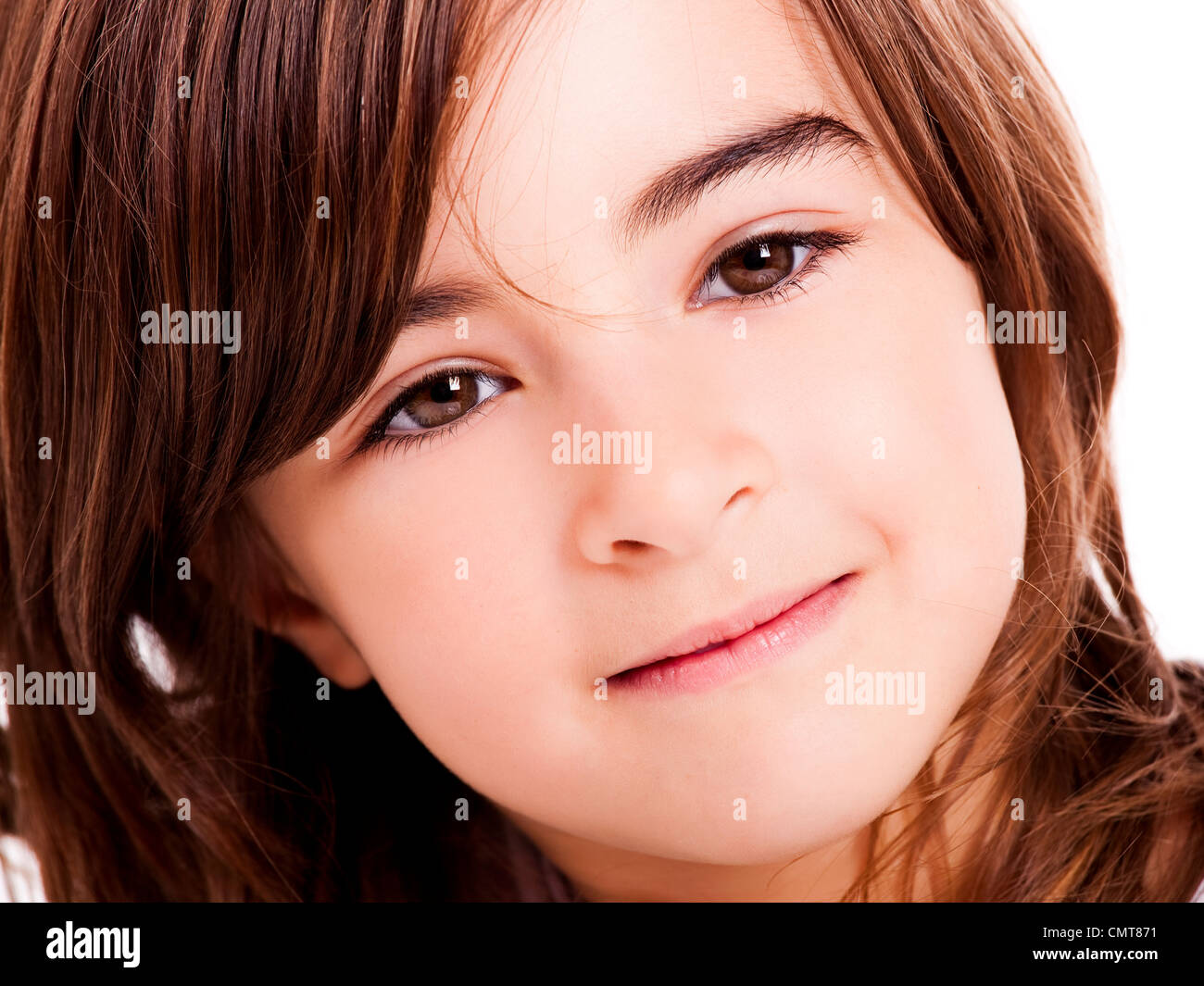 Close-up portrait of a little girl looking at the camera Stock Photo ...