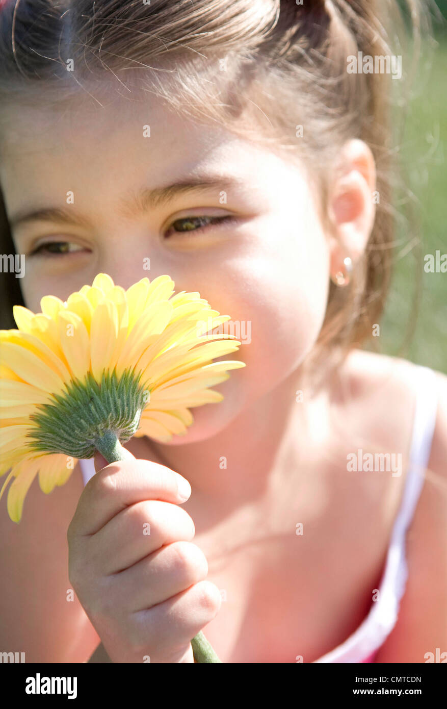 Little girl with a flower, Queen Elizabeth Park, Vancouver, British ...