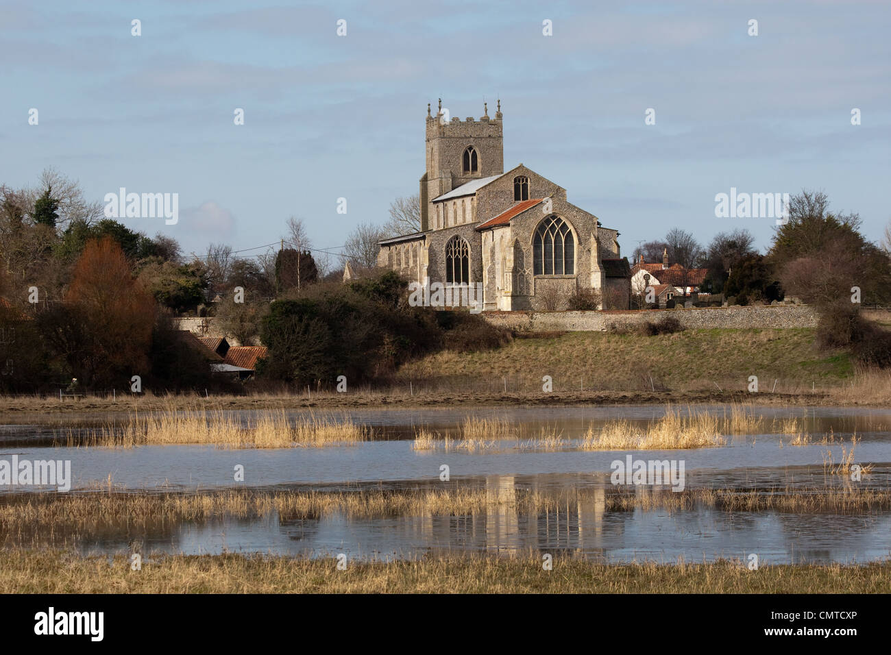 Wiveton church standing above the water meadows, Norfolk Stock Photo ...