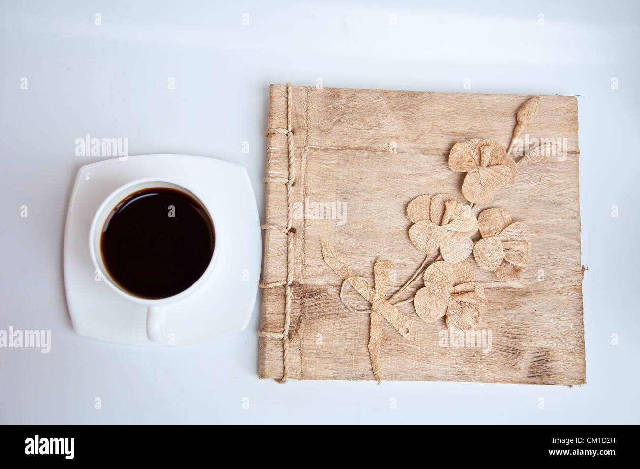Black coffee and paper on white background Stock Photo - Alamy