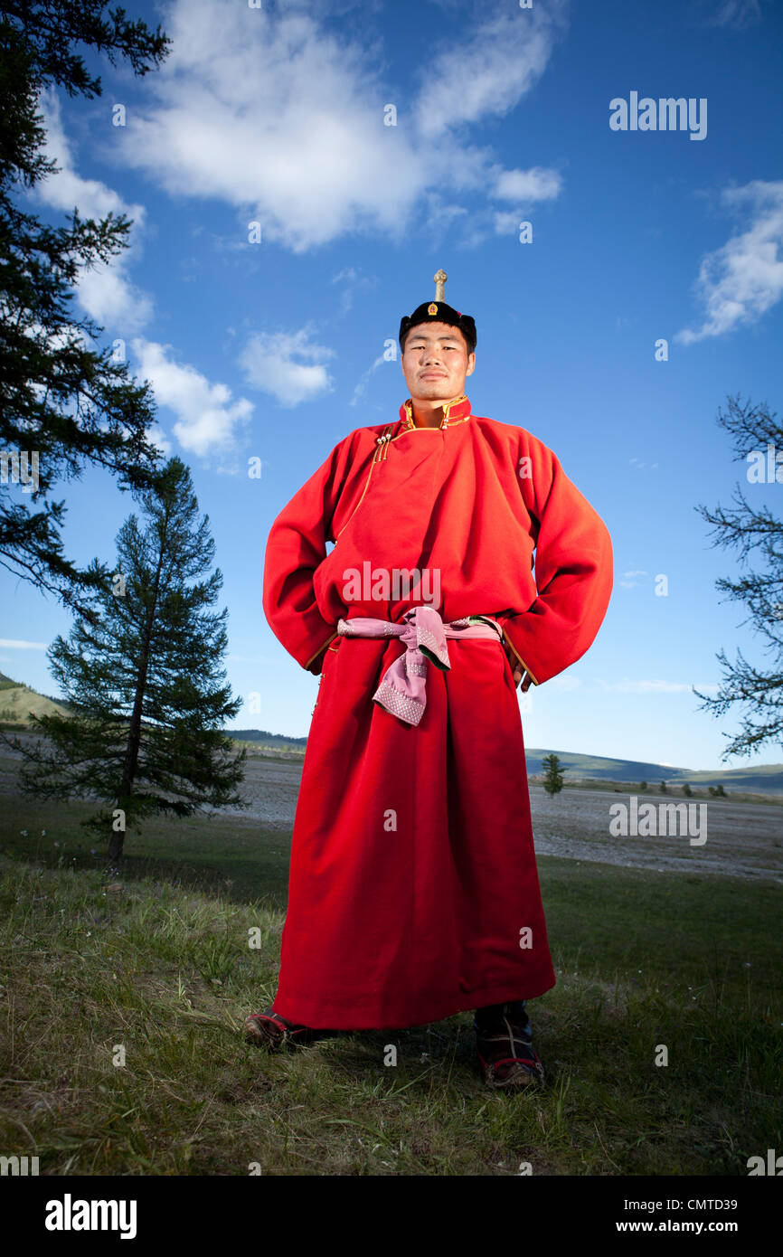 Portrait of Mongolian wrestler on traditional red cloth, Mongolia Stock ...