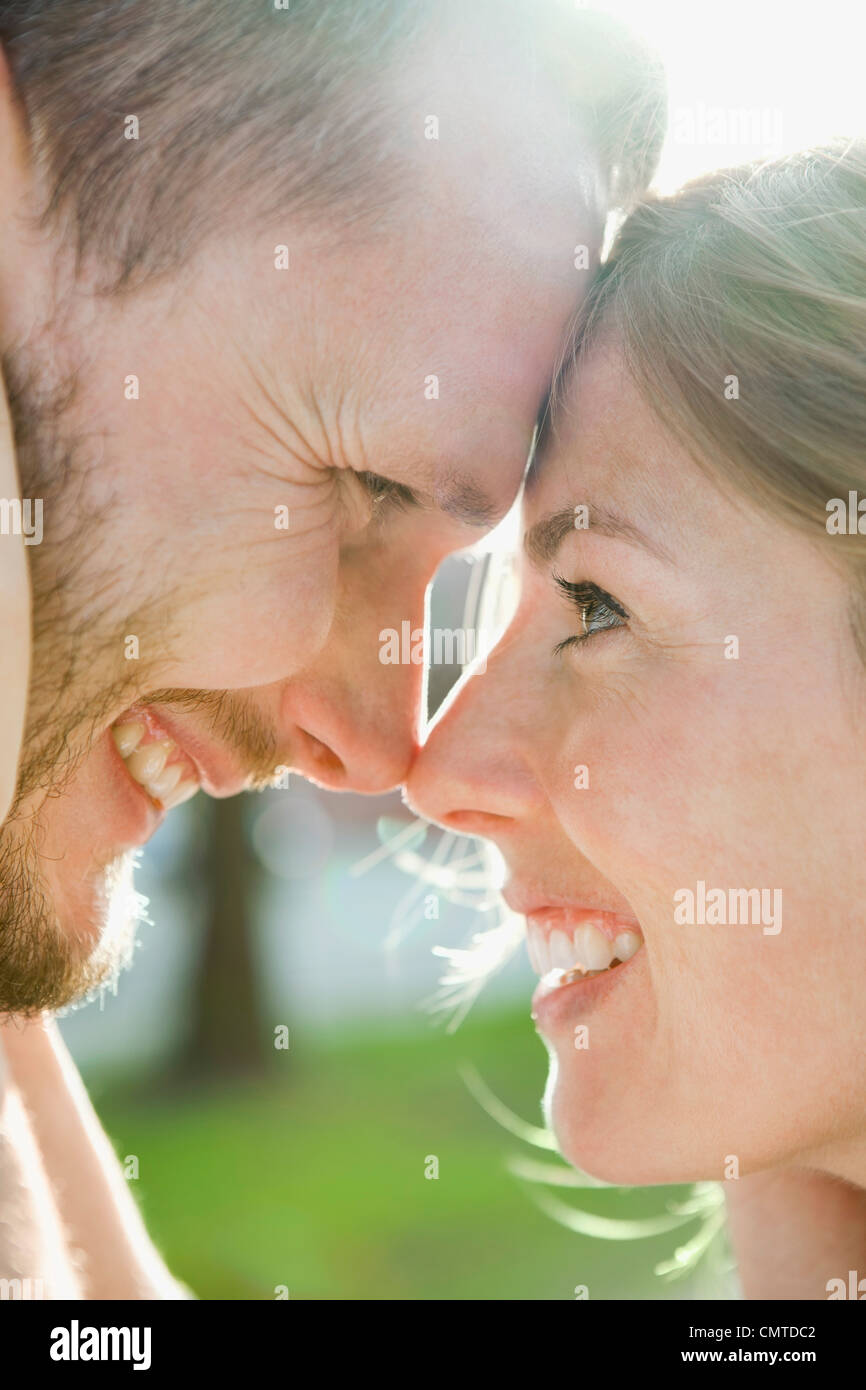 Loving couple face to face Stock Photo - Alamy