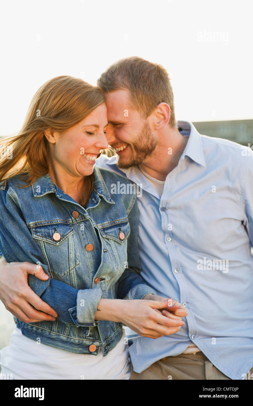Romantic couple embracing Stock Photo - Alamy