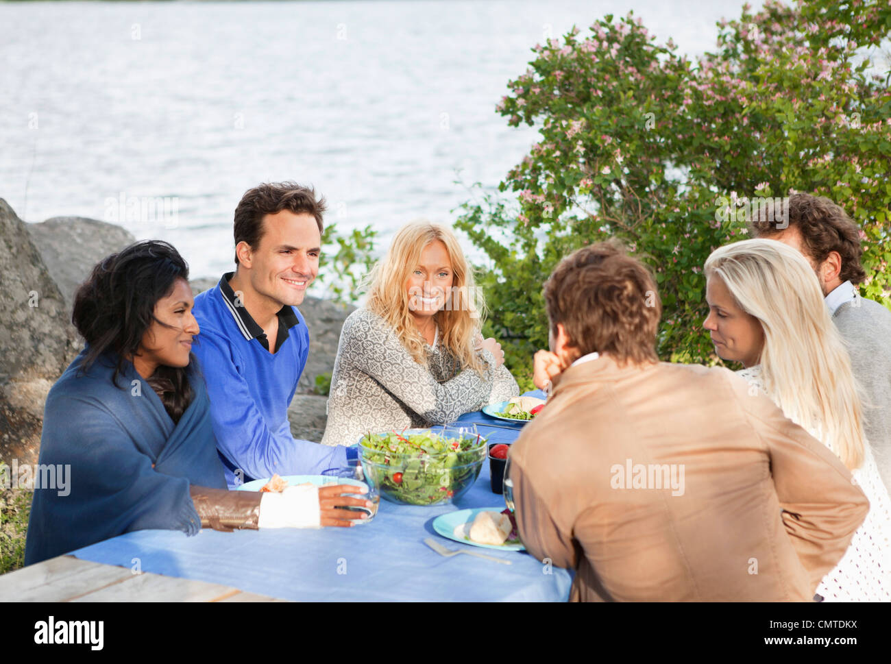 Friends at dinner outside Stock Photo - Alamy