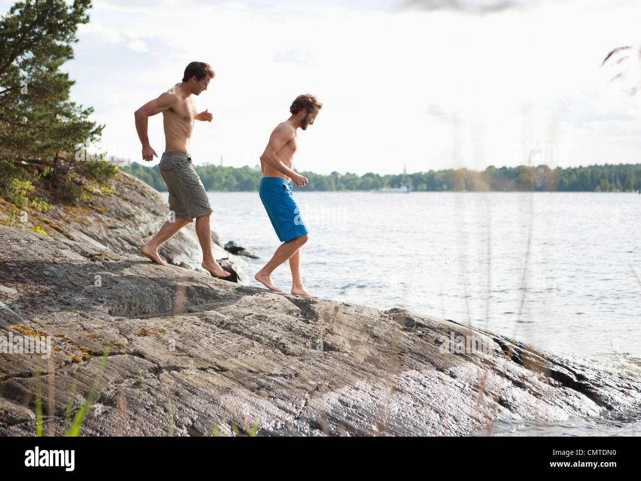 Two men bathing Stock Photo - Alamy