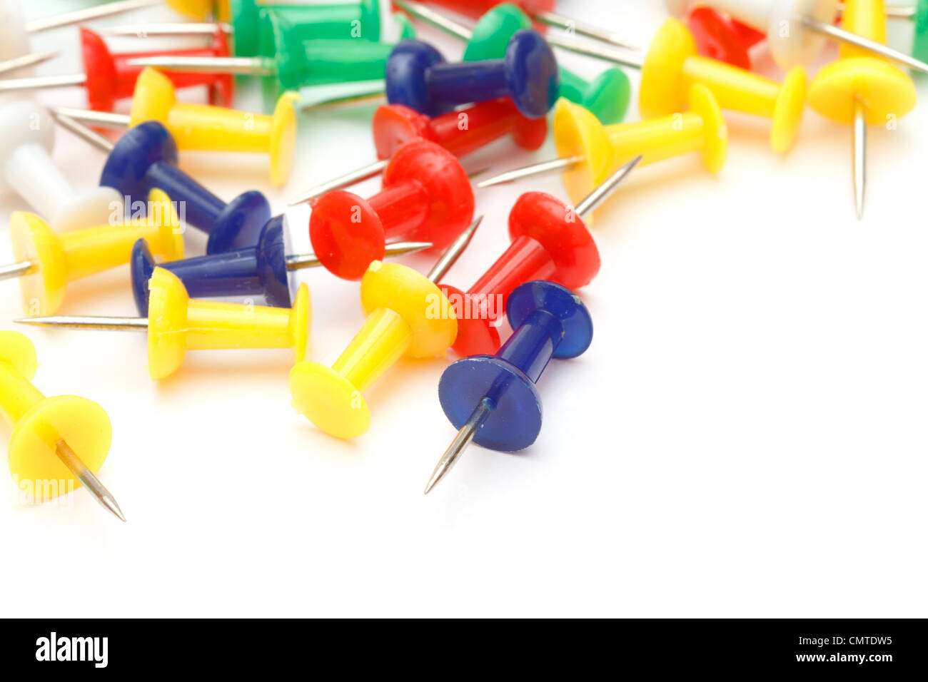 Colorful office push pins closeup on white Stock Photo - Alamy
