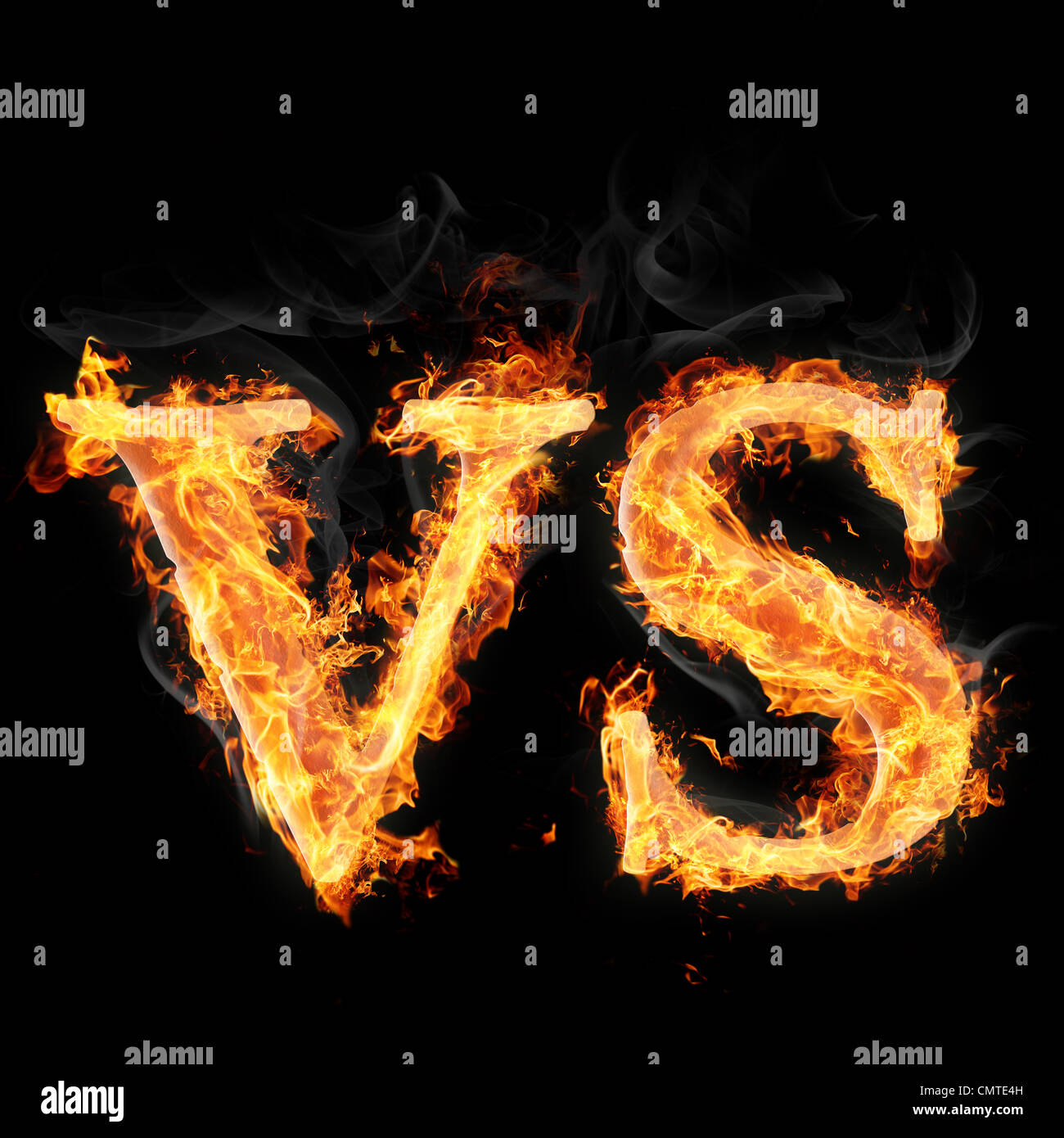 Letters and symbols in fire on black background - Versus Stock Photo ...