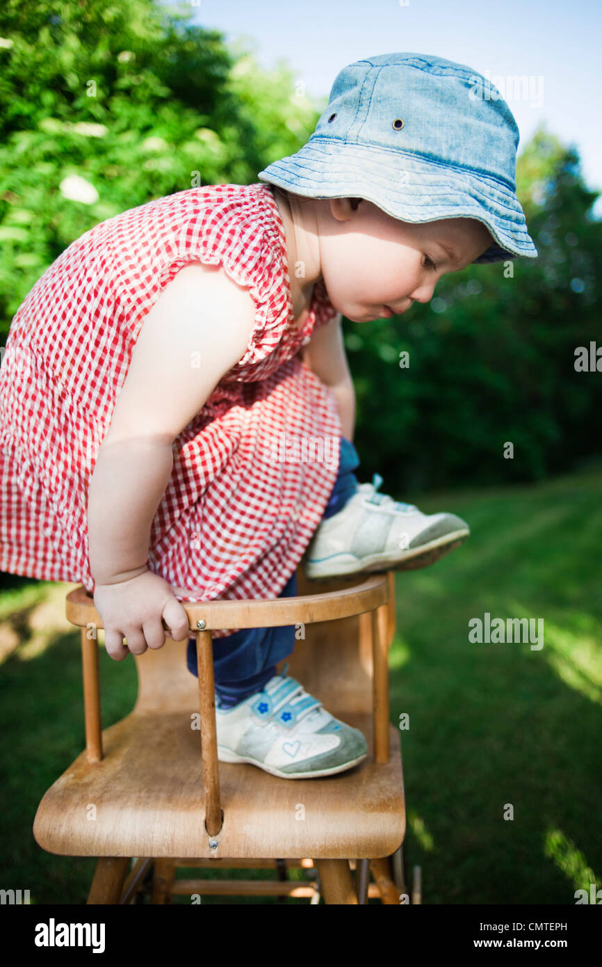 Child climbing chair hi-res stock photography and images - Alamy