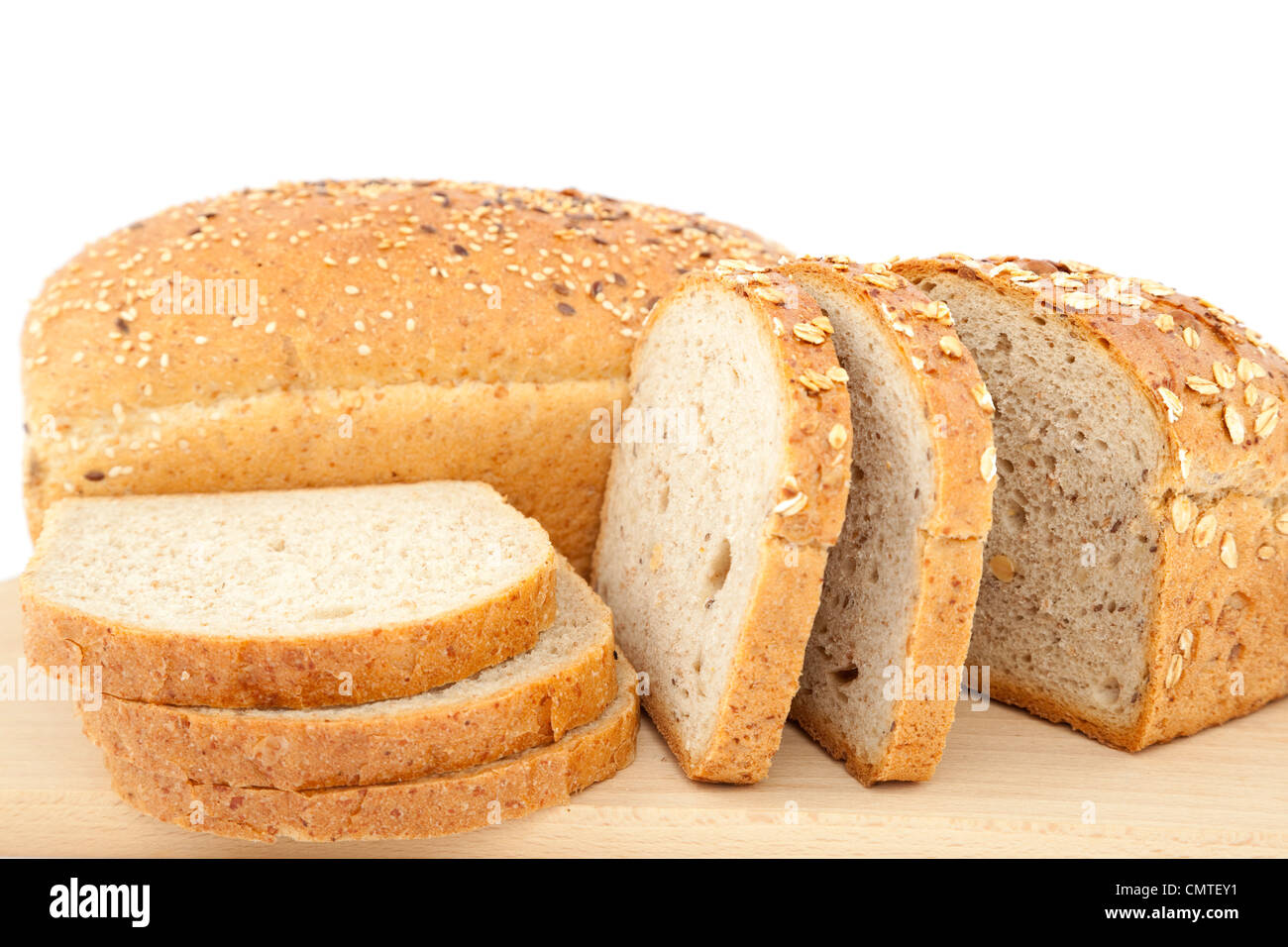 whole bread and slice of bread on white background Stock Photo - Alamy