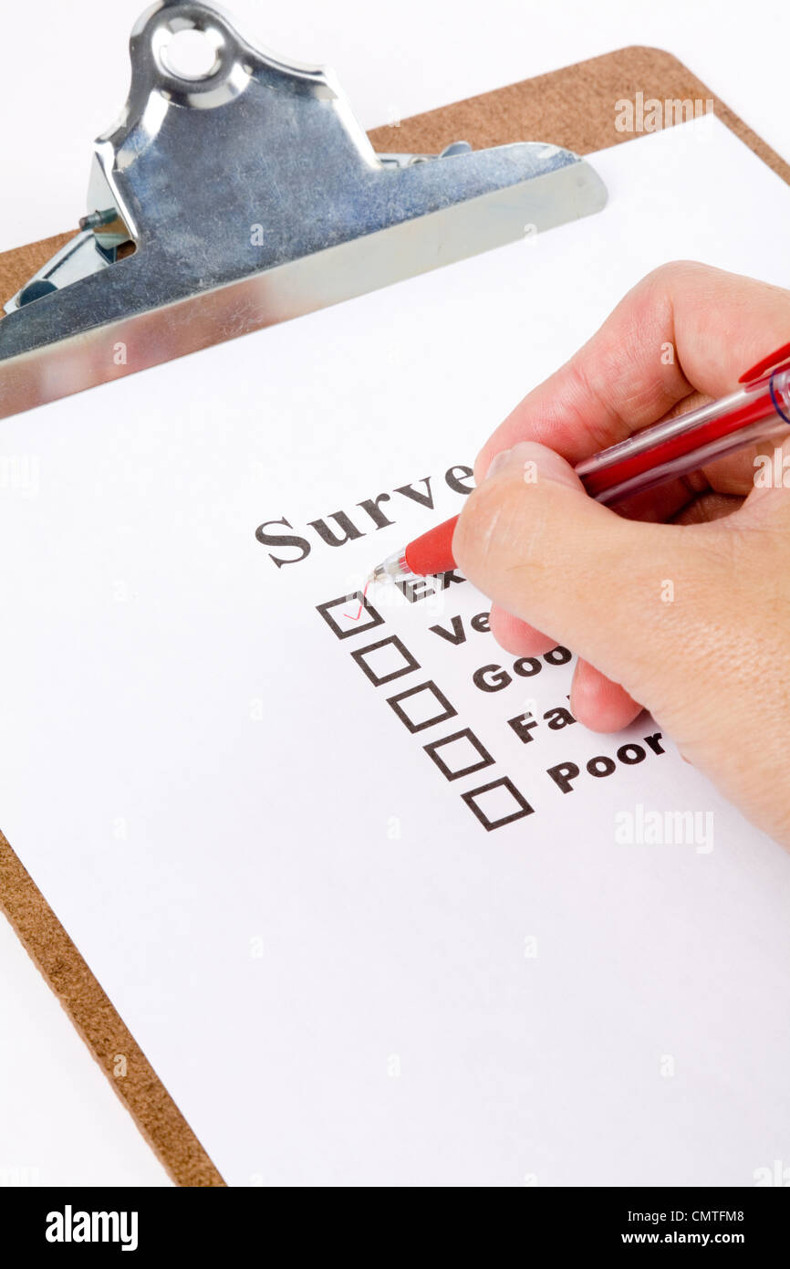 questionnaire and pen, business concept Stock Photo - Alamy