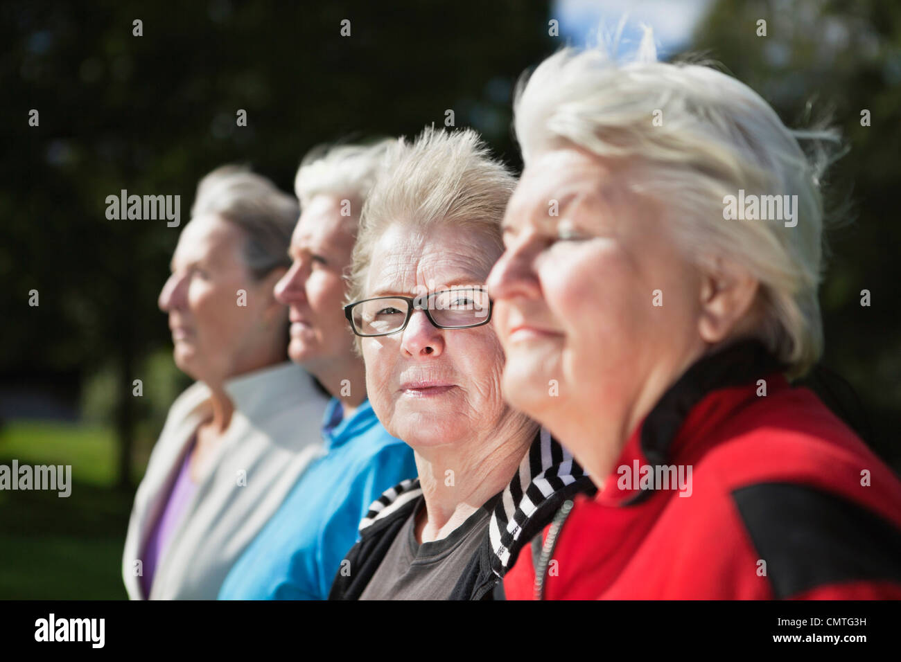 Four people in a park hi-res stock photography and images - Alamy