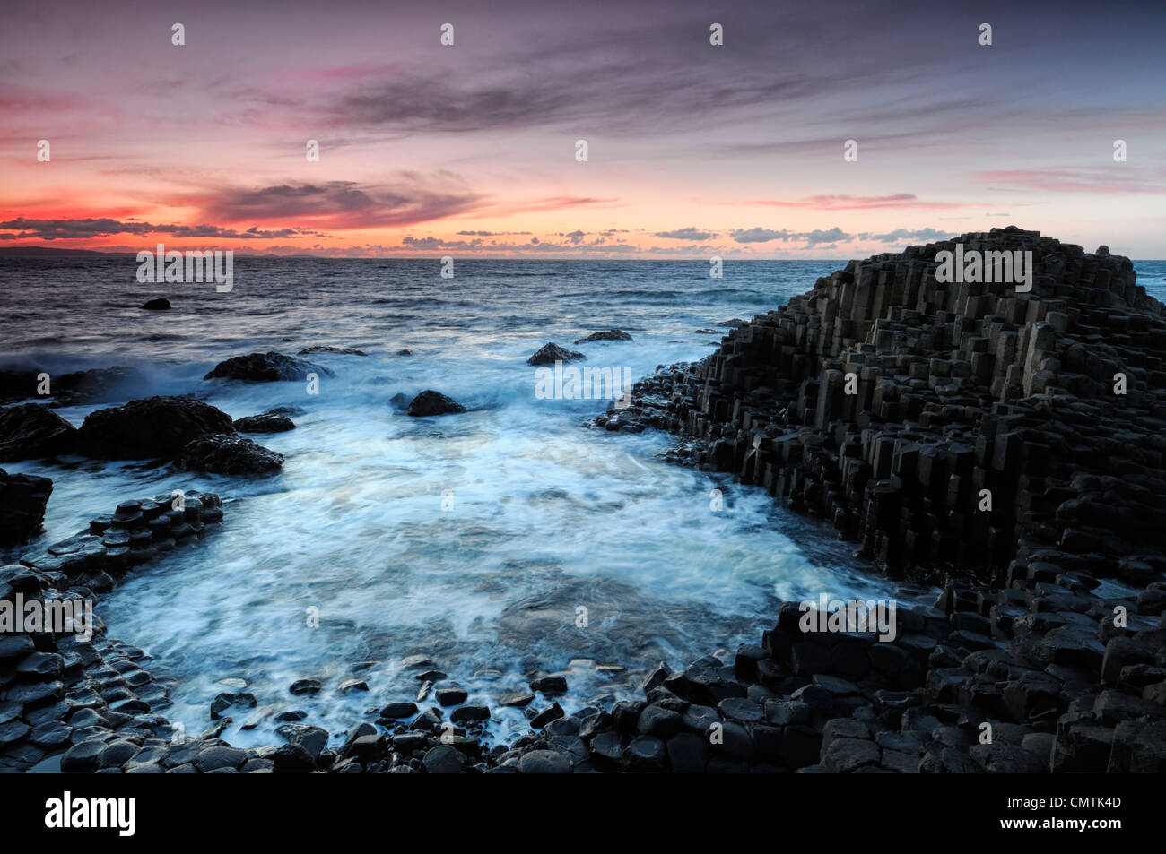 sunset sky skies over the hexagonal shaped basalt columns Giant's ...