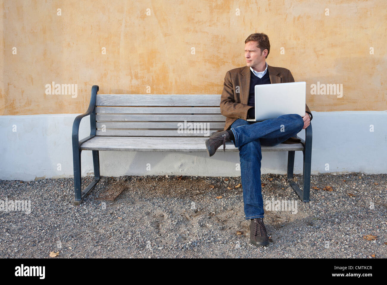 Sitting Man On Bench