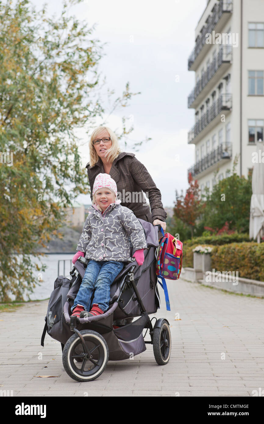 Pulling stroller hi-res stock photography and images - Alamy