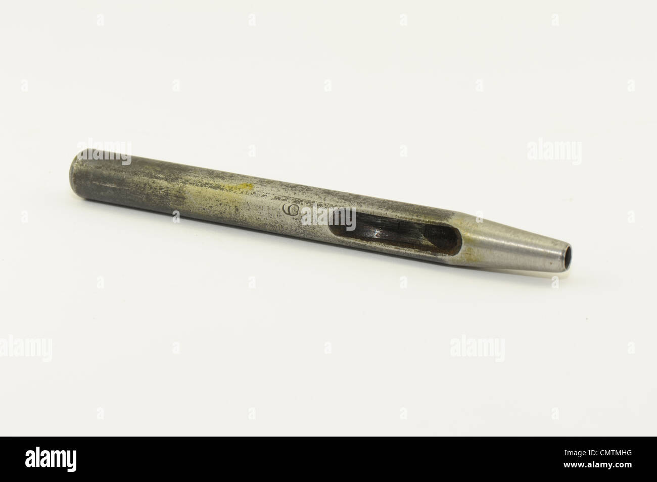 hole punch tool 6mm taken on white background Stock Photo - Alamy