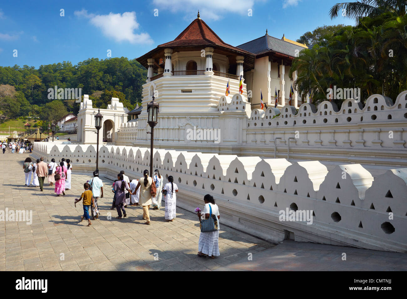 Sri Lanka - pilgrims going to the temple Temple of the Tooth, Kandy ...