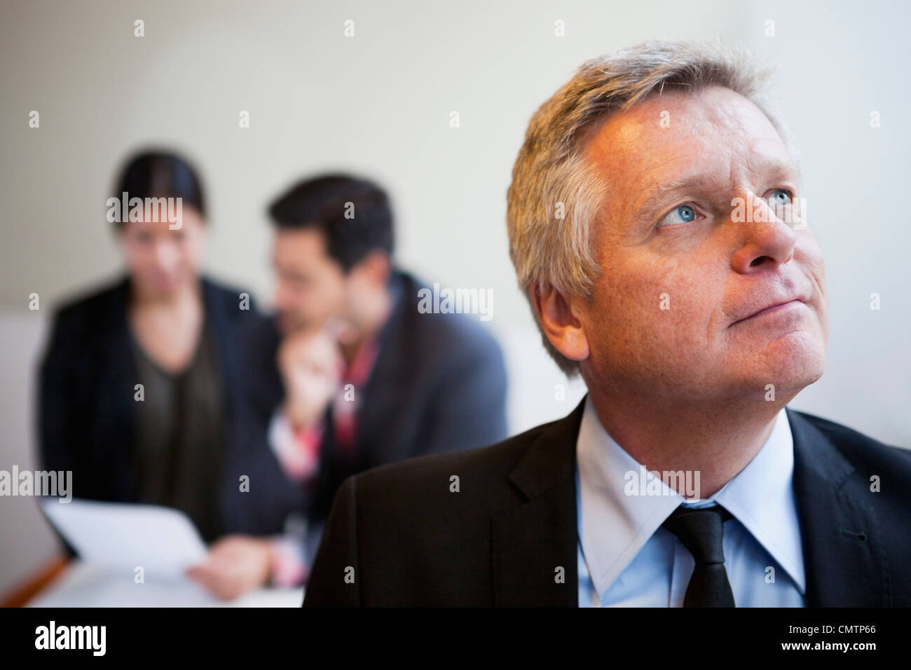 businessman looking up Stock Photo - Alamy