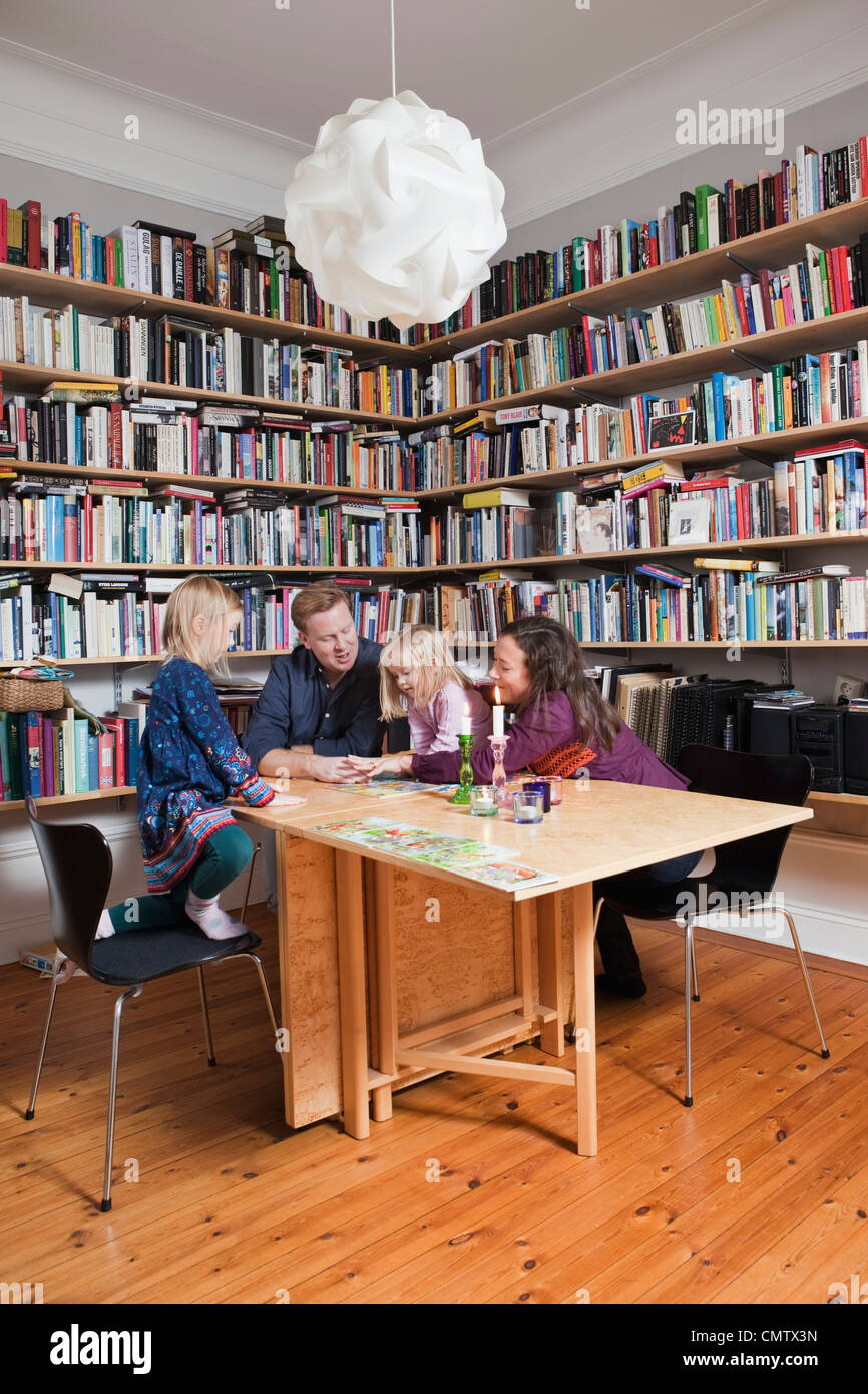 Family at home Stock Photo - Alamy