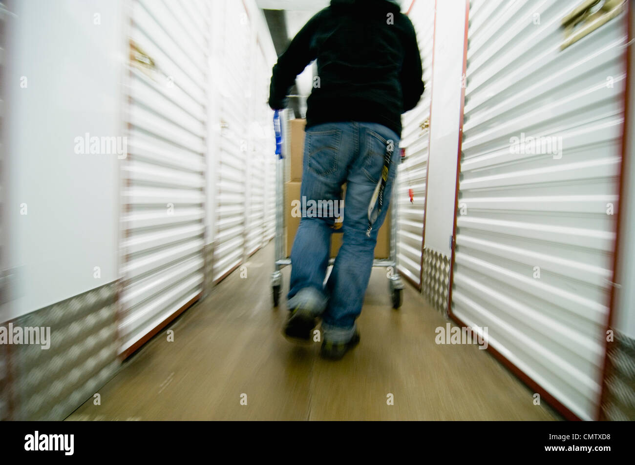 Person Walking With Cart High Resolution Stock Photography and Images ...