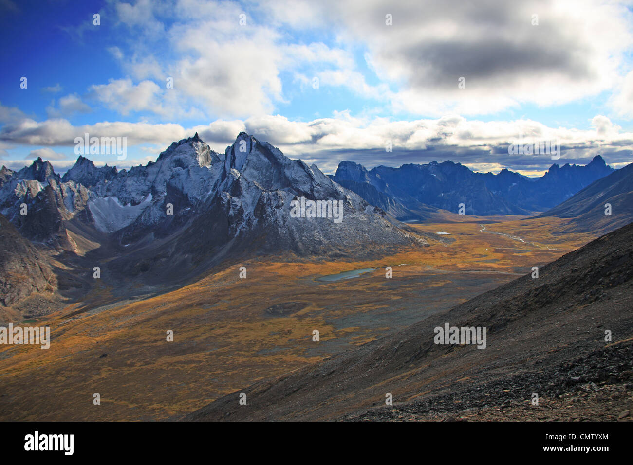 The Tombstone Pass with Mount Monolith and Tombstone Mountain in autumn ...