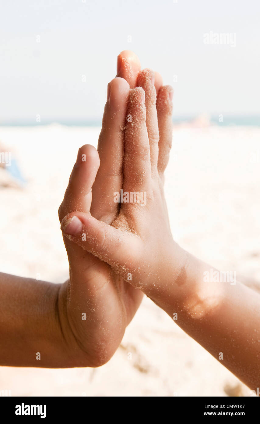Hands touching sand hi-res stock photography and images - Alamy