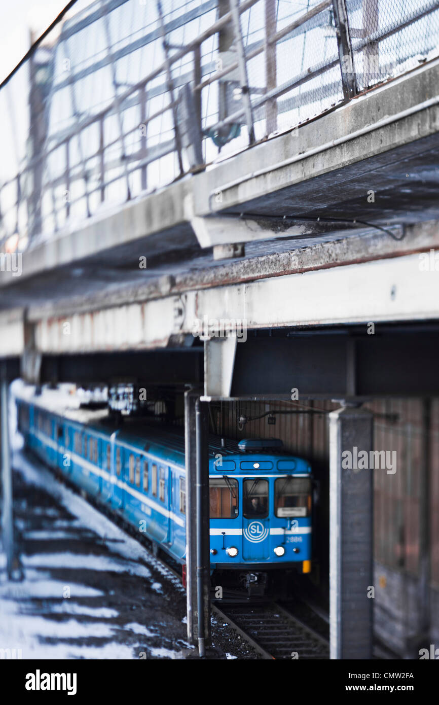 Train passing under the bridge hi-res stock photography and images - Alamy