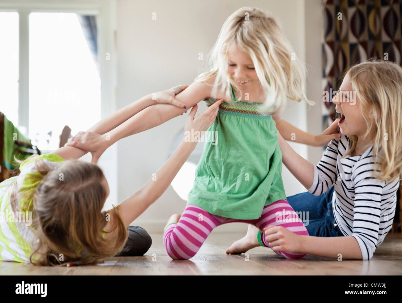 Three sisters having fun together Stock Photo - Alamy