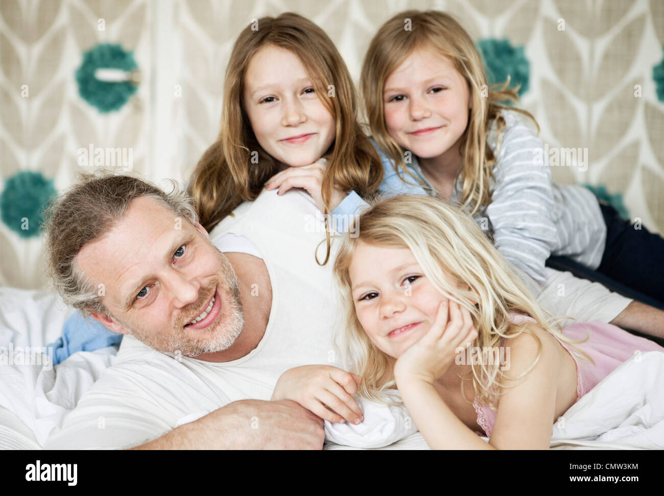 Family with three daughters hi-res stock photography and images - Alamy
