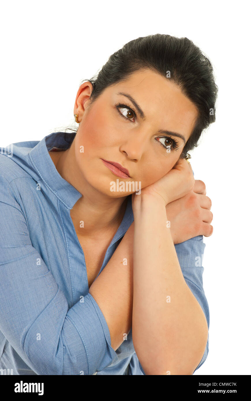 Sad woman resting face on hands and thinking isolated on white ...