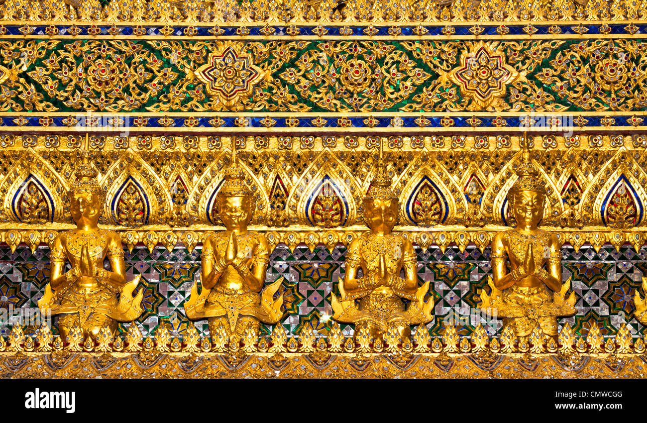 Native art carved on the wall in the temple Stock Photo - Alamy