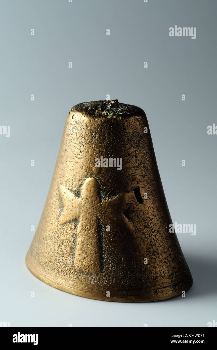 Ancient bronze bell with cross decoration. Height 7.8 cm Base 8, 1 x 5 ...