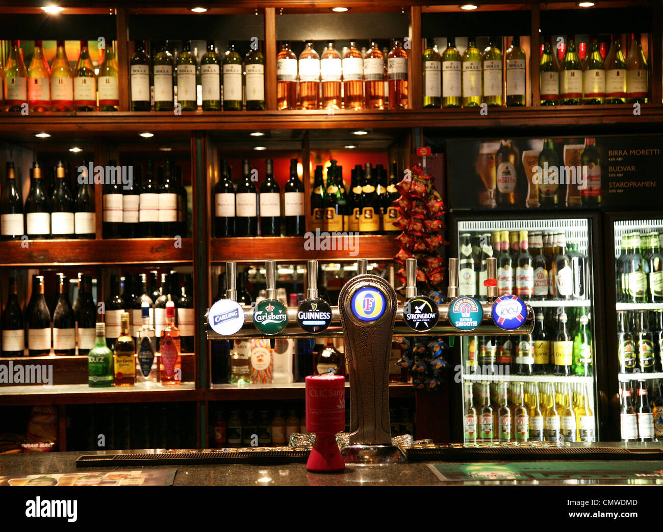 Inside view of a public house, known as pub, for drinking and ...
