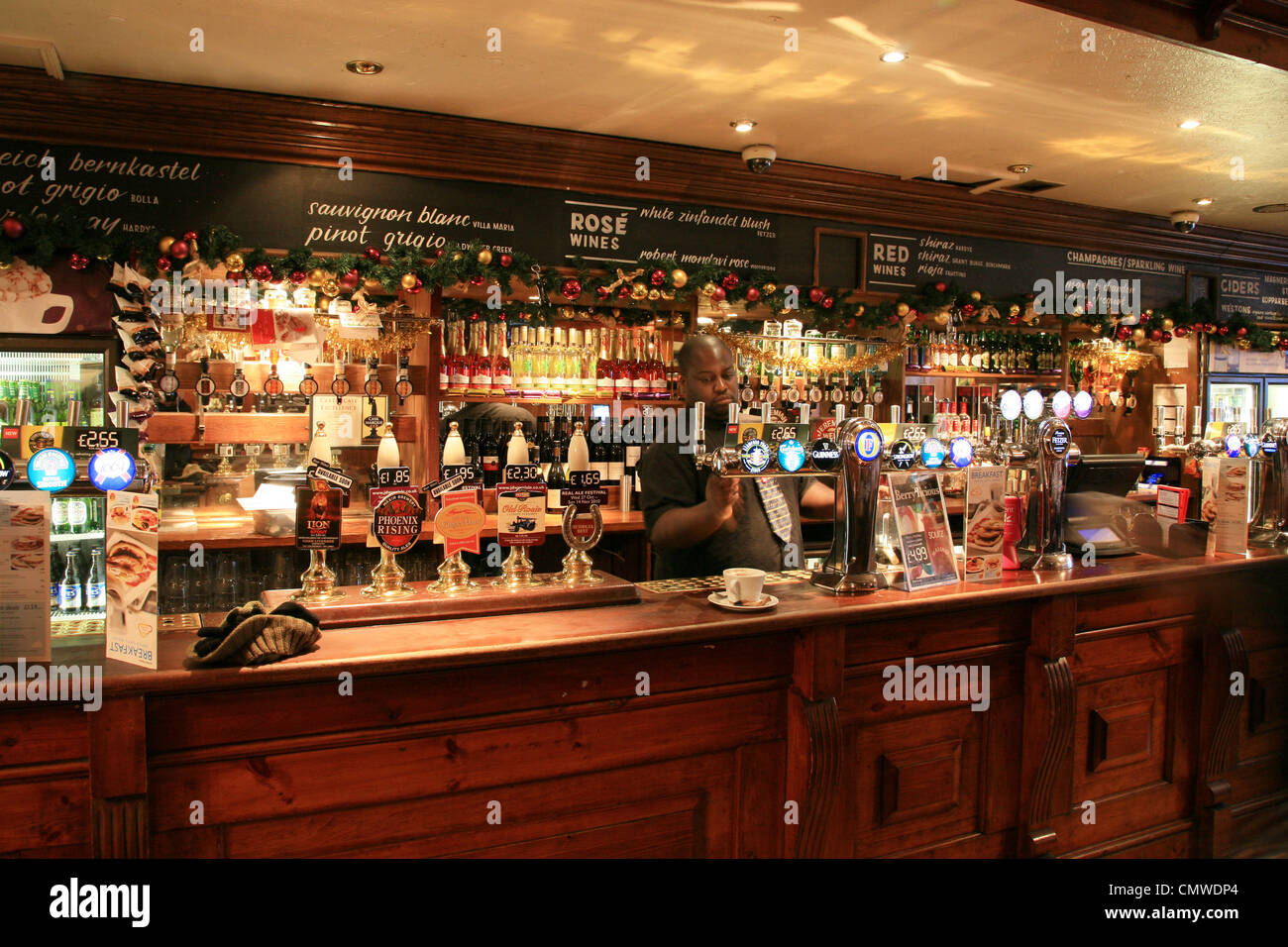 Inside view of a public house, known as pub, for drinking and ...