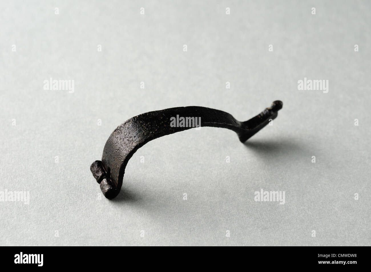 Roman fibula made of bronze from the Archaeological site of Complutum ...