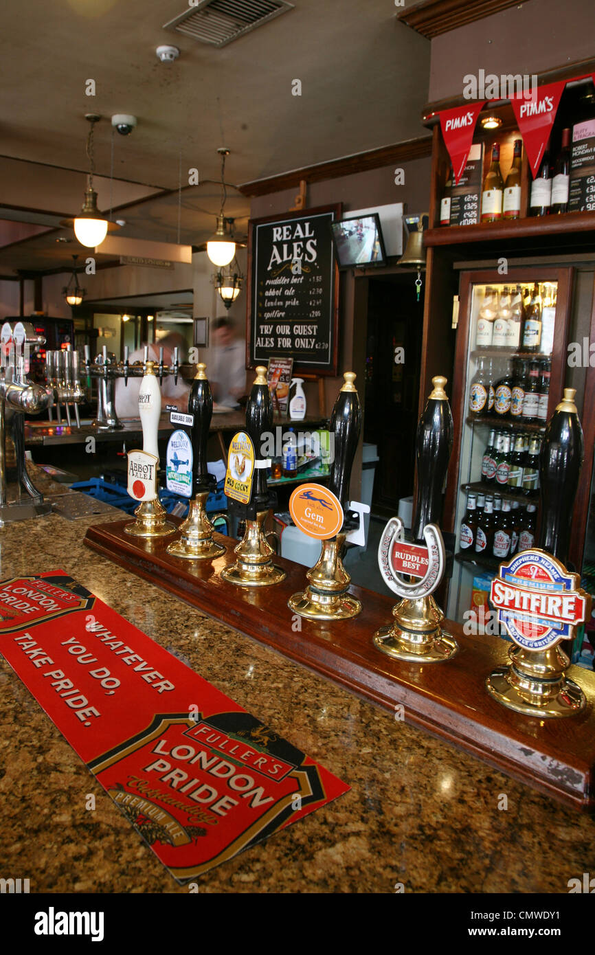 Inside view of a public house, known as pub, for drinking and ...