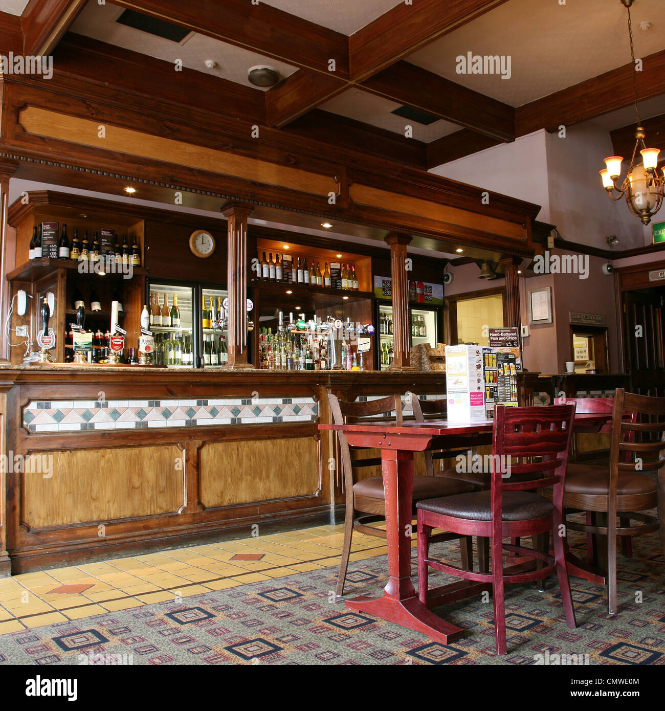 Inside view of a public house, known as pub, for drinking and ...