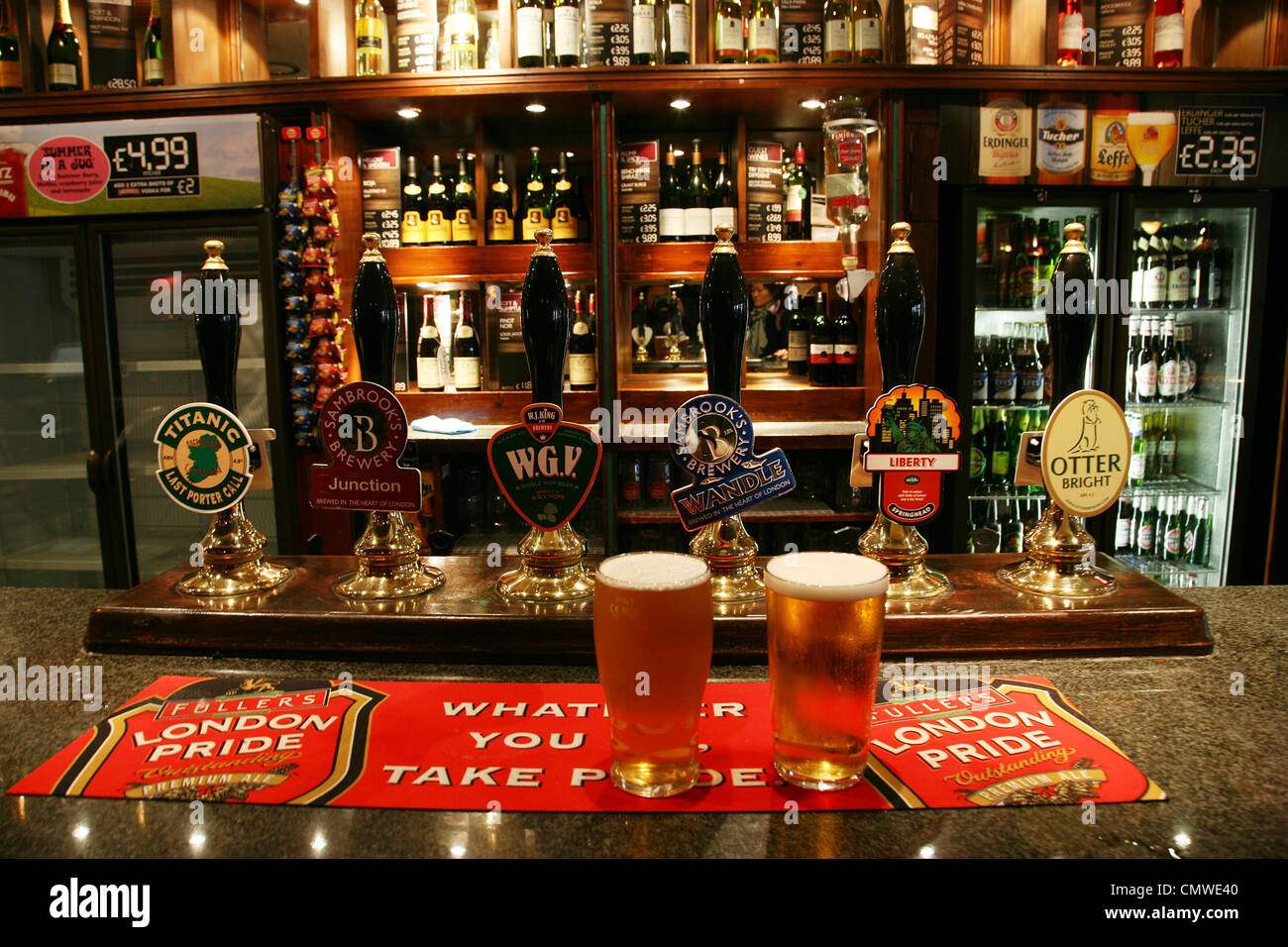 Inside view of a public house, known as pub, for drinking and ...