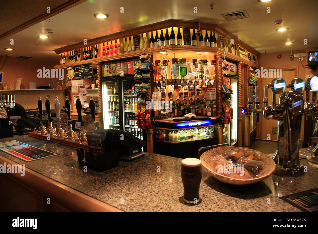 Inside view of a public house, known as pub, for drinking and ...