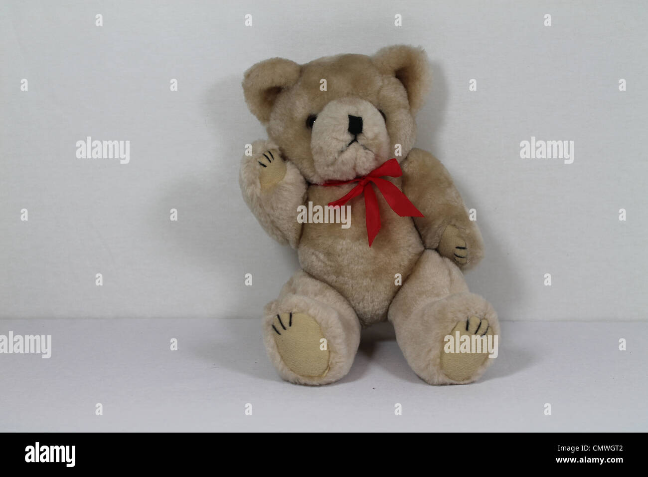 Waving Teddy Bear Stock Photo - Alamy
