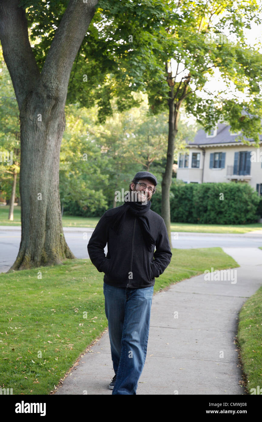 Man Walking down Street in Fall, Toronto, Ontario Stock Photo - Alamy