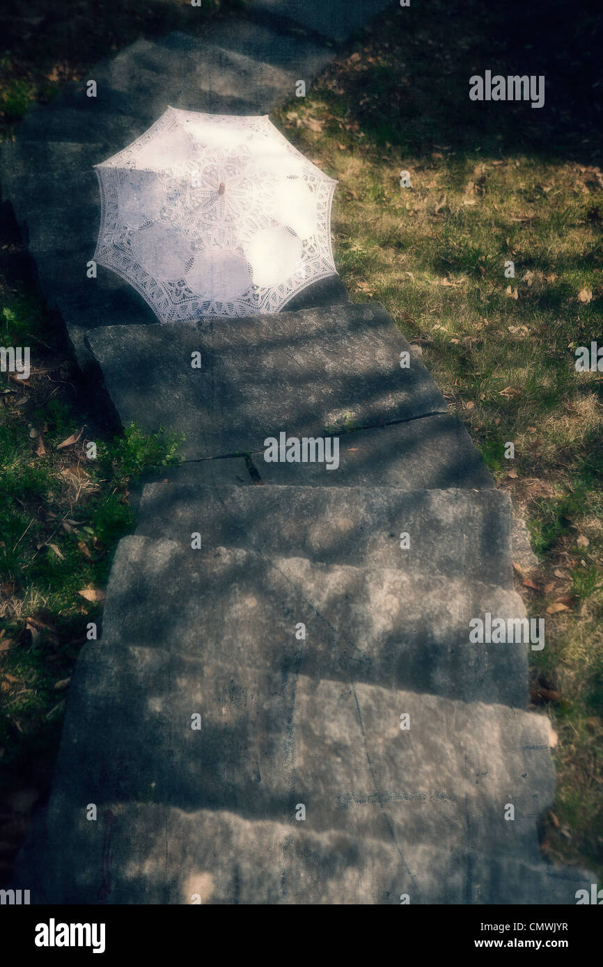 Umbrella on a stone staircase Stock Photo - Alamy
