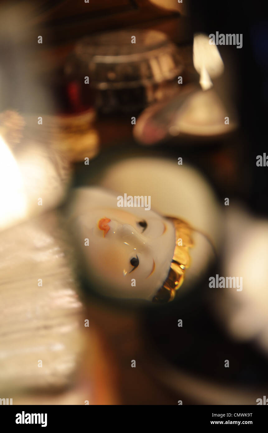 Portrait of a porcelain woman with crown at dressing table Stock Photo ...