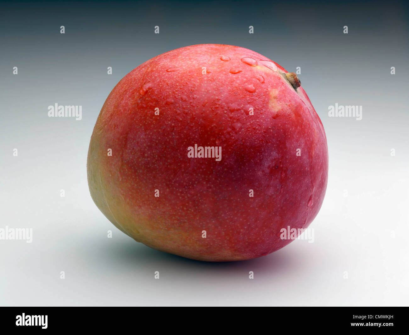 Whole ripe mango fresh tropical fruit Stock Photo - Alamy