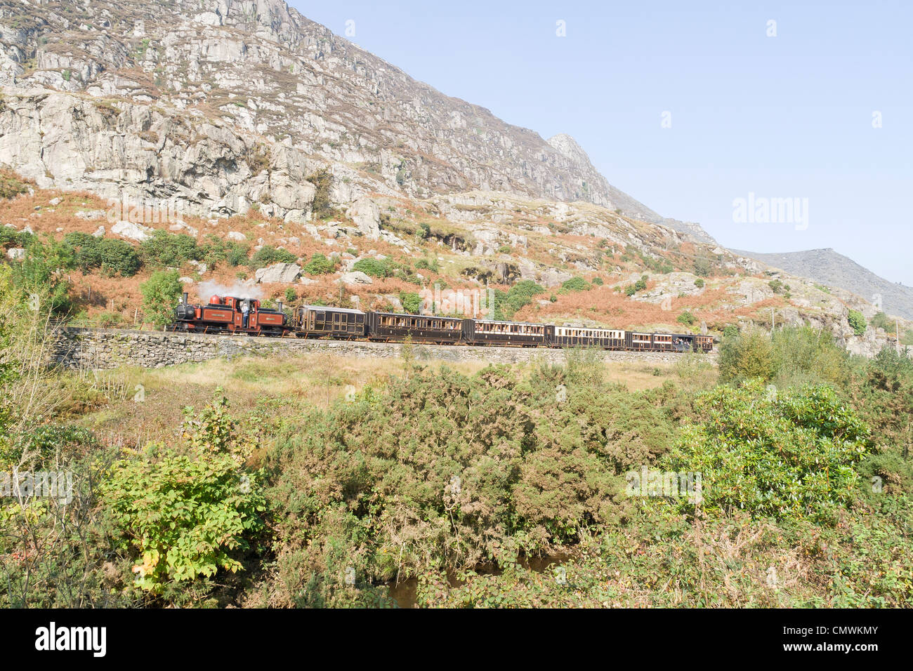 Steam locomotive pulling a passenger train on the Blaenau Ffestiniog railway Stock Photo - Alamy