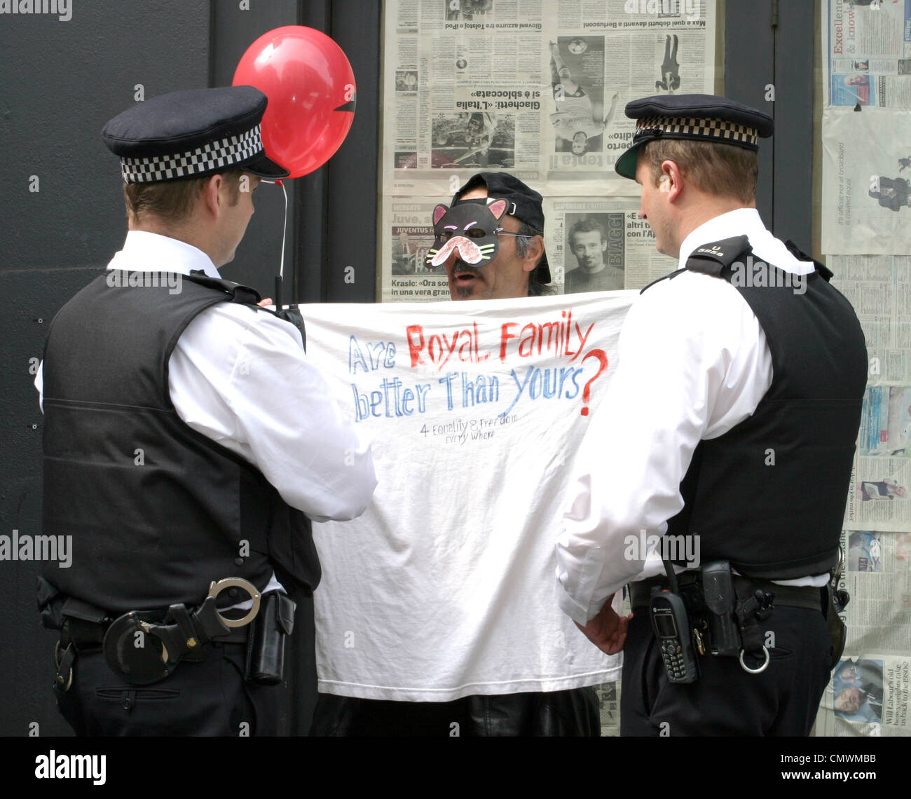 Police stopping youth for questioning during Royal wedding Stock Photo ...