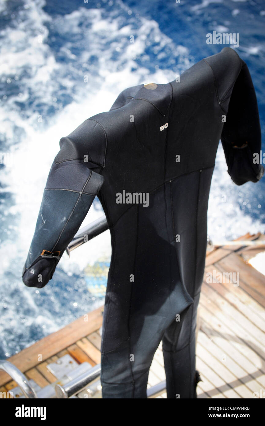 wetsuit on the back of a dive boat Stock Photo - Alamy