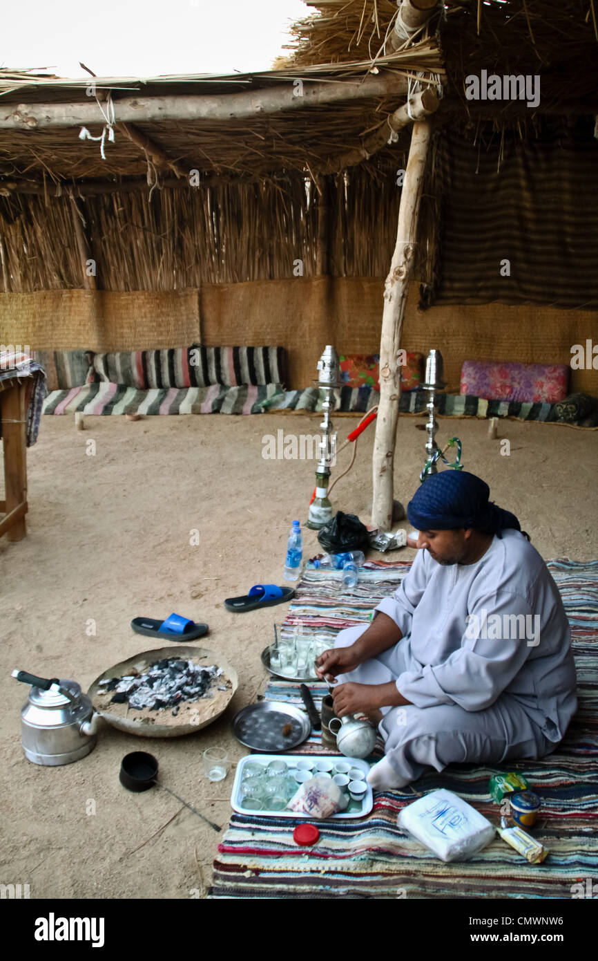 Bedouins of the Eastern Desert of Egypt, preparing the tea with their ...